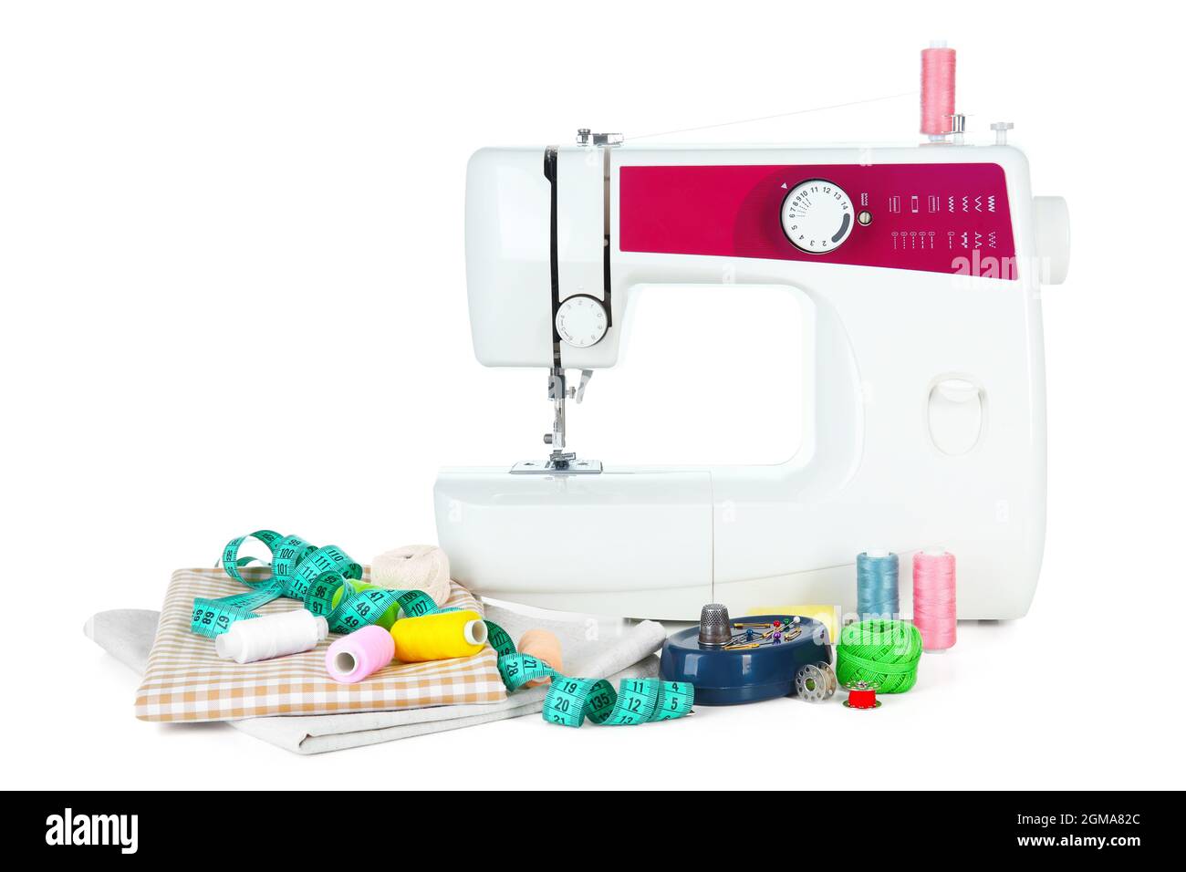 Sewing machine, fabric and threads on white background Stock Photo - Alamy