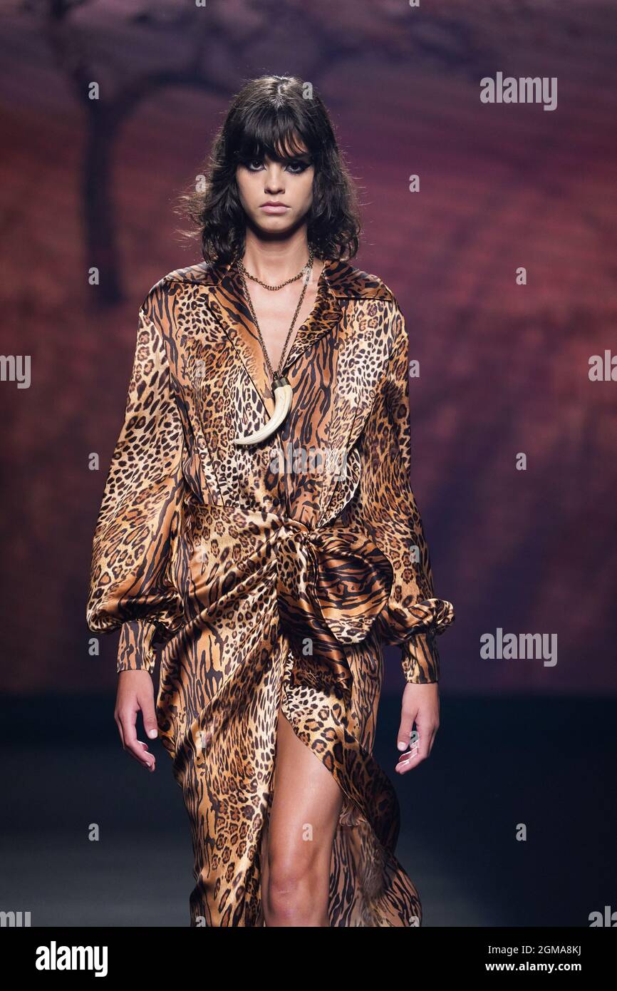 Madrid, Spain. 17th Sep, 2021. A model walks the runway at the Lola Pertegaz fashion show during ...