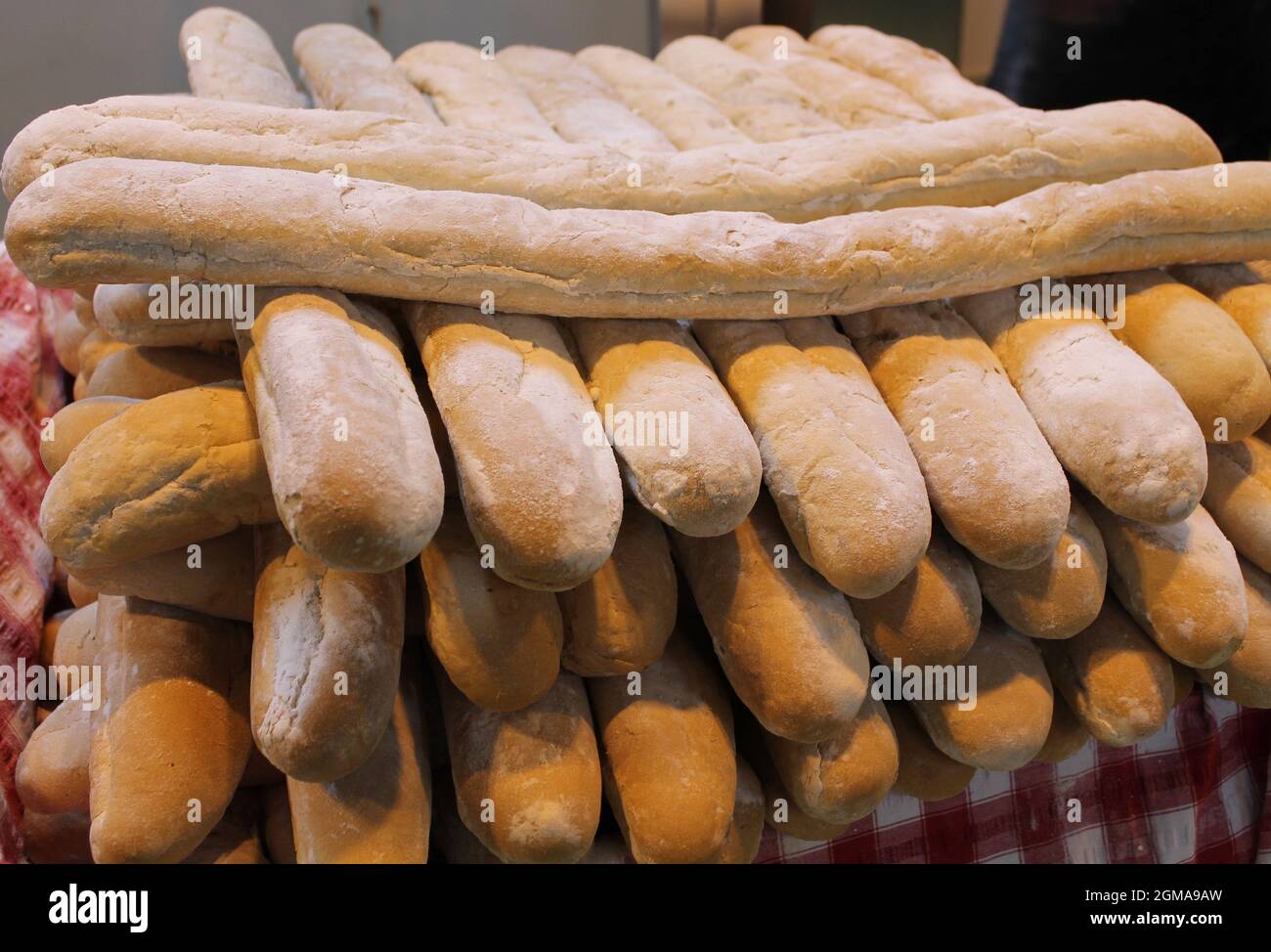 A Stack of Freshly Baked French Stick Bread Loaves Stock Photo - Alamy