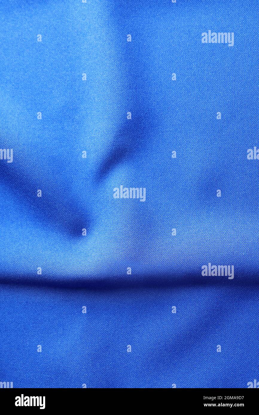 Fabric texture with folds as background Stock Photo - Alamy