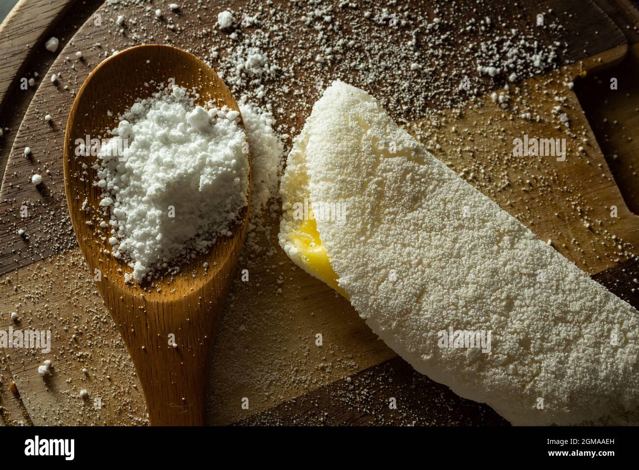 Tapioca, a typical Brazilian dish, with mozzarella filling on a ...