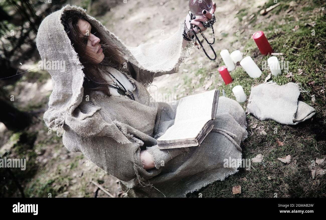 Fairy magician. A sorcerer with a glass sphere, a magical spell and a ...