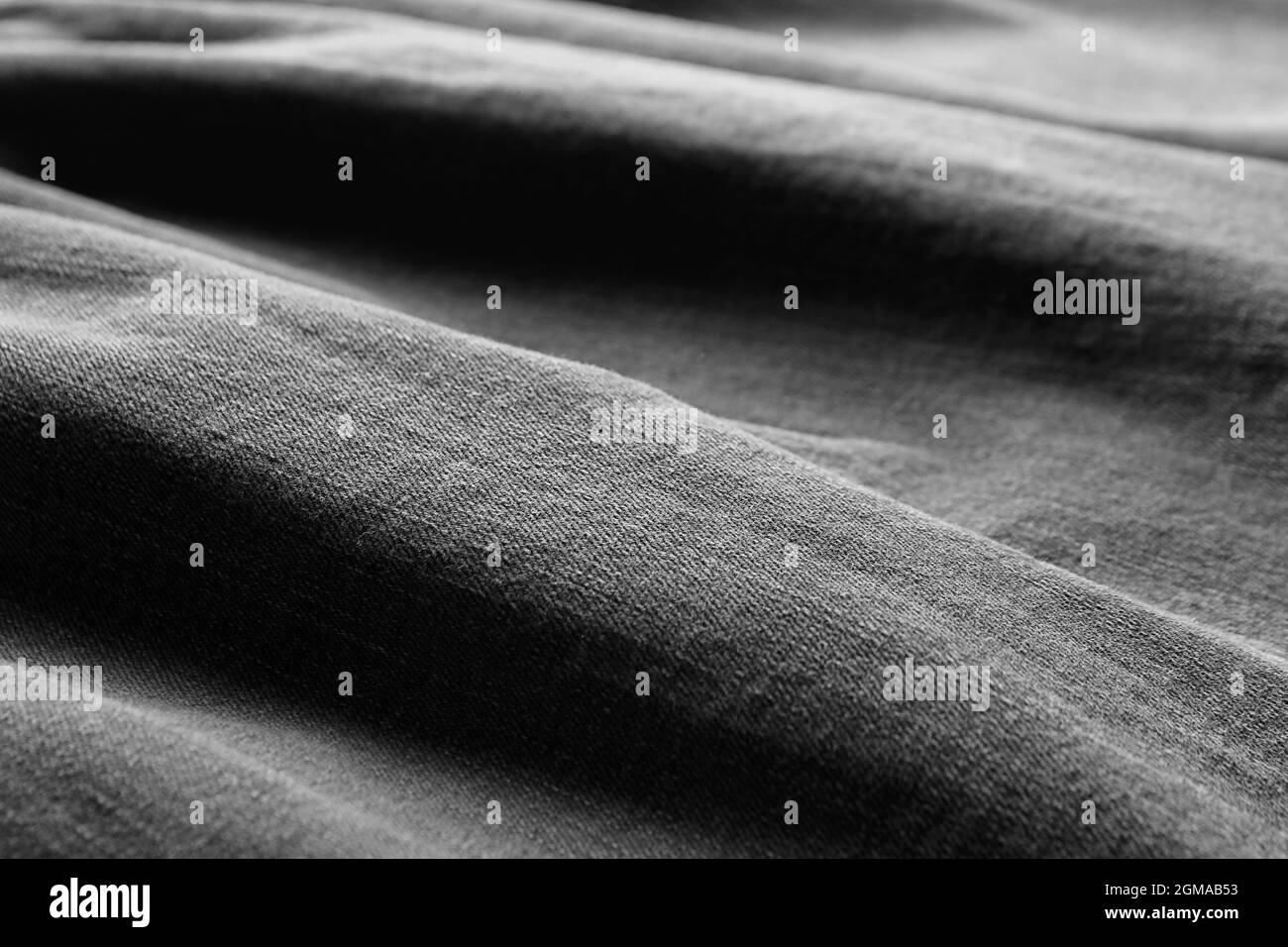 Fabric texture with folds as background Stock Photo - Alamy