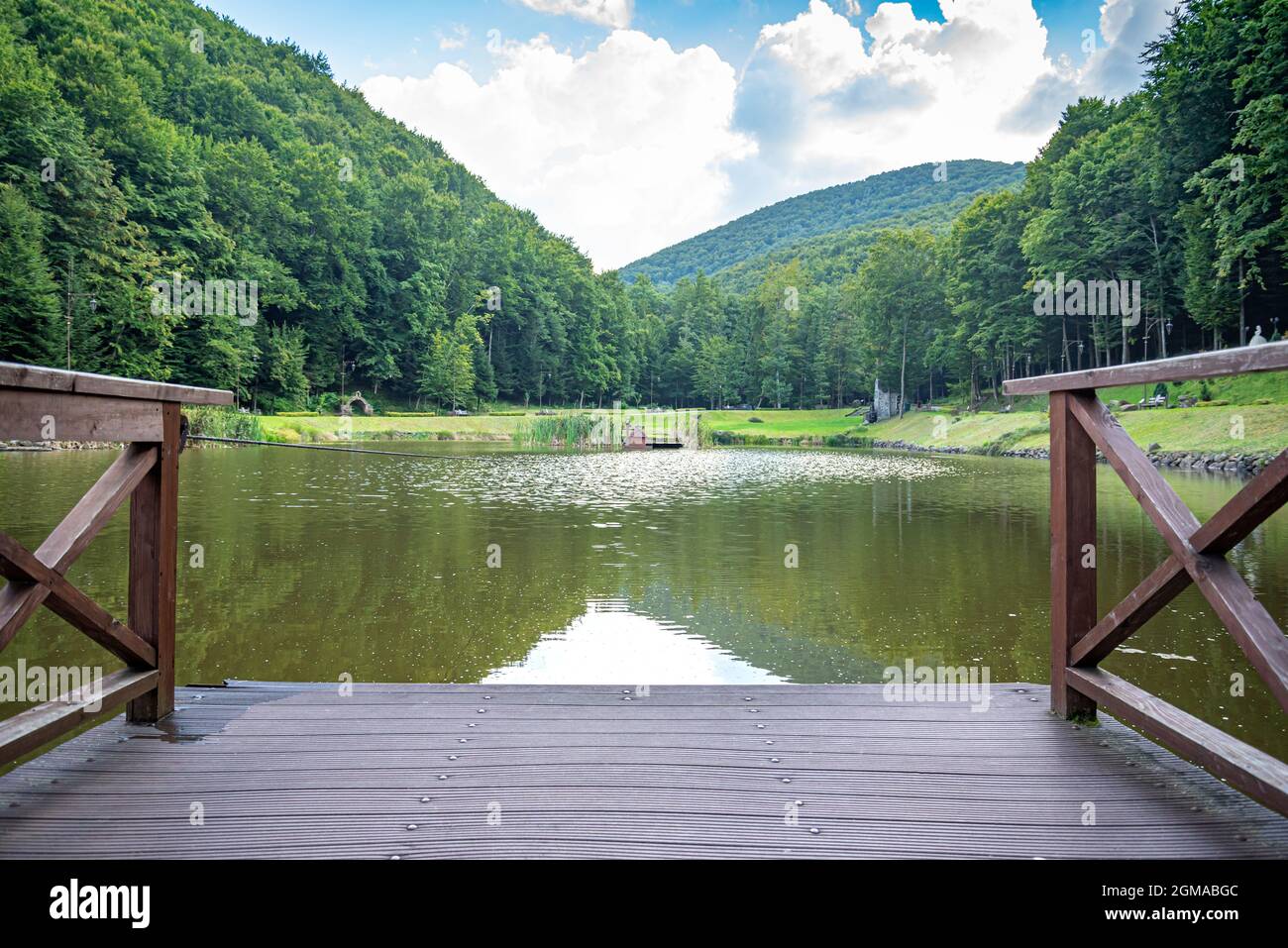 Wooden ferry on the lake Stock Photo - Alamy