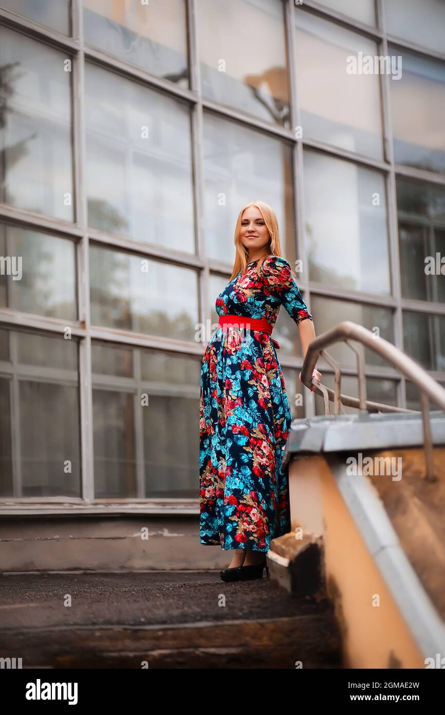 Girl in the street with an umbrella for a walk on a summer day Stock ...