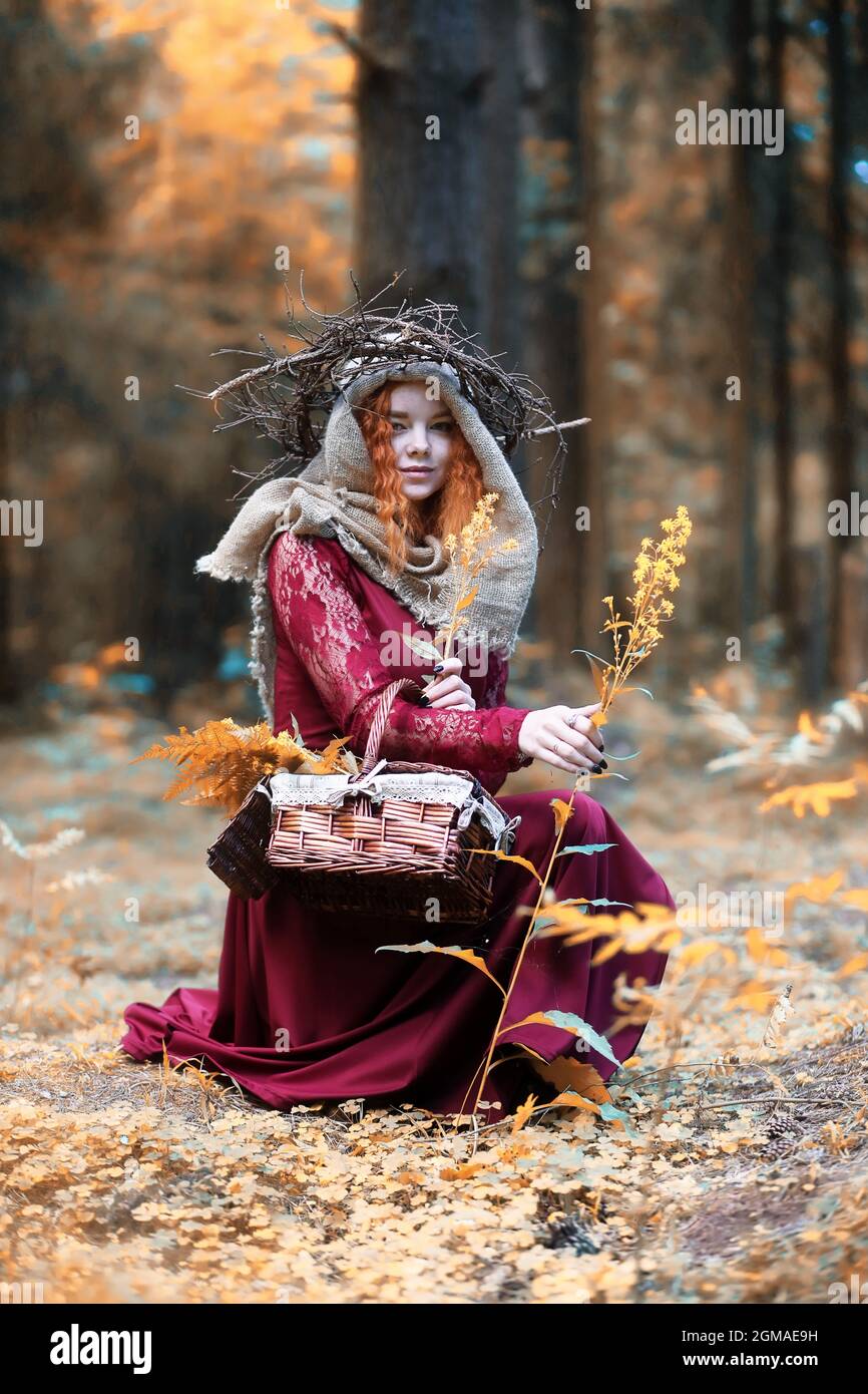 Fortune-teller conducts a ritual in the depths of the forest Stock ...