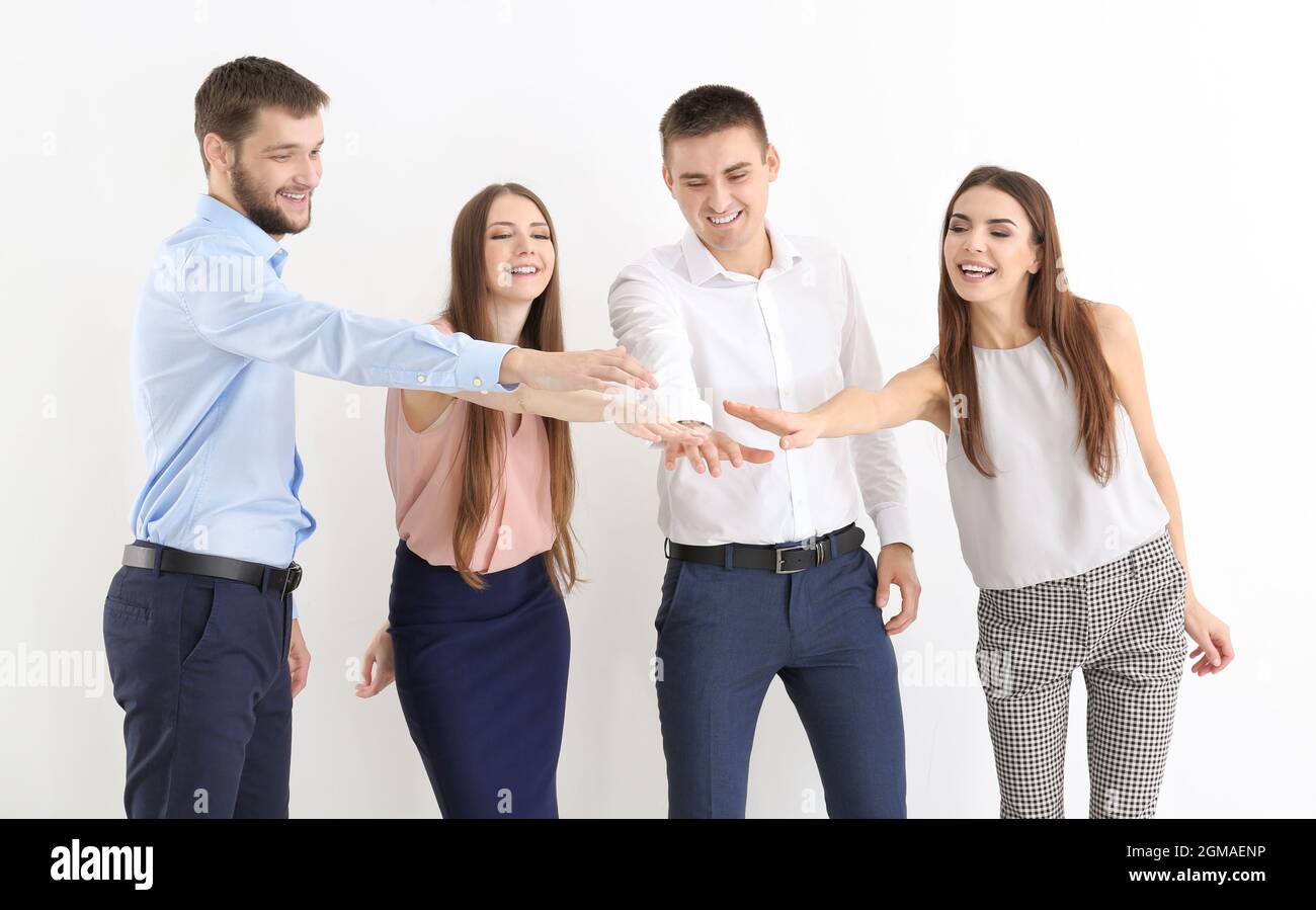 People putting hands together on white background. Unity concept Stock ...