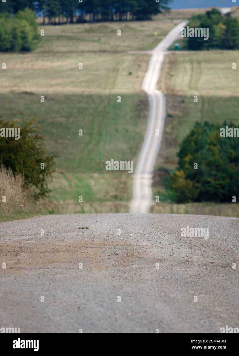 1 mile long track through meadows and woodland disappears over a ...