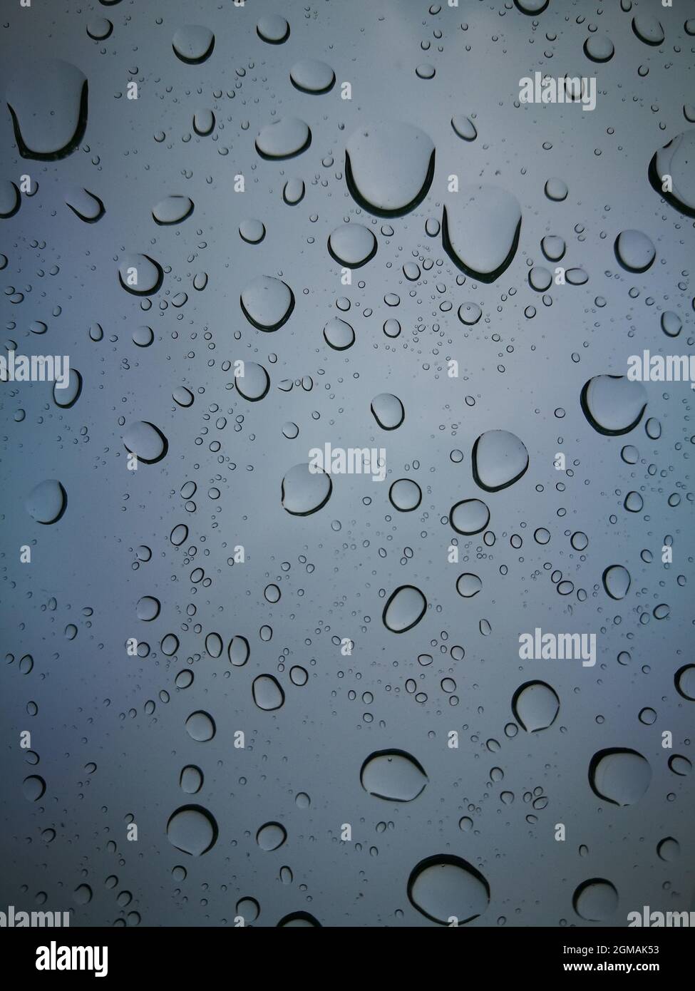 Closeup of water droplets on a glass surface Stock Photo - Alamy