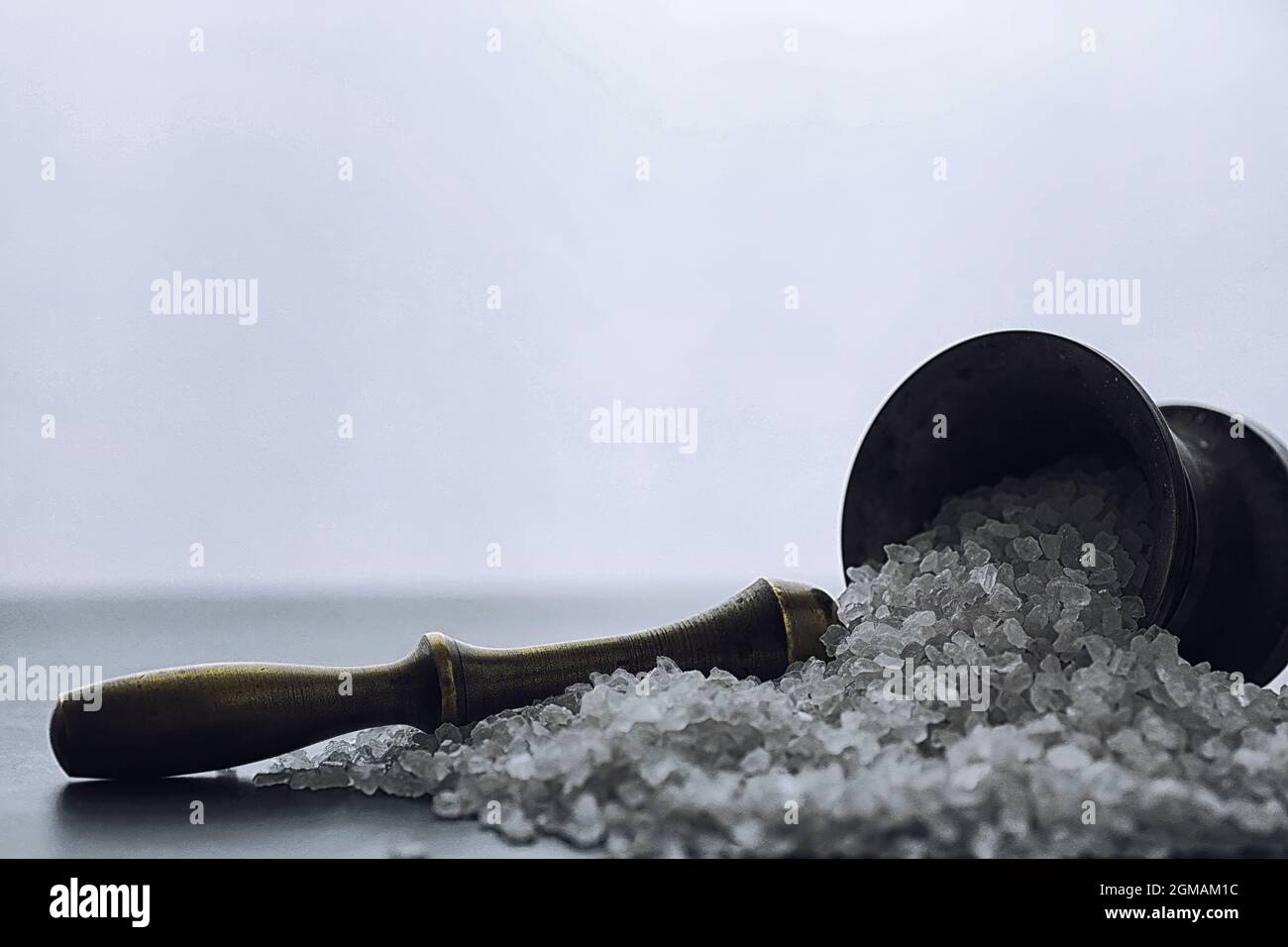 Large sea salt. Spice. Mortar and pestle for grinding salt Stock Photo ...