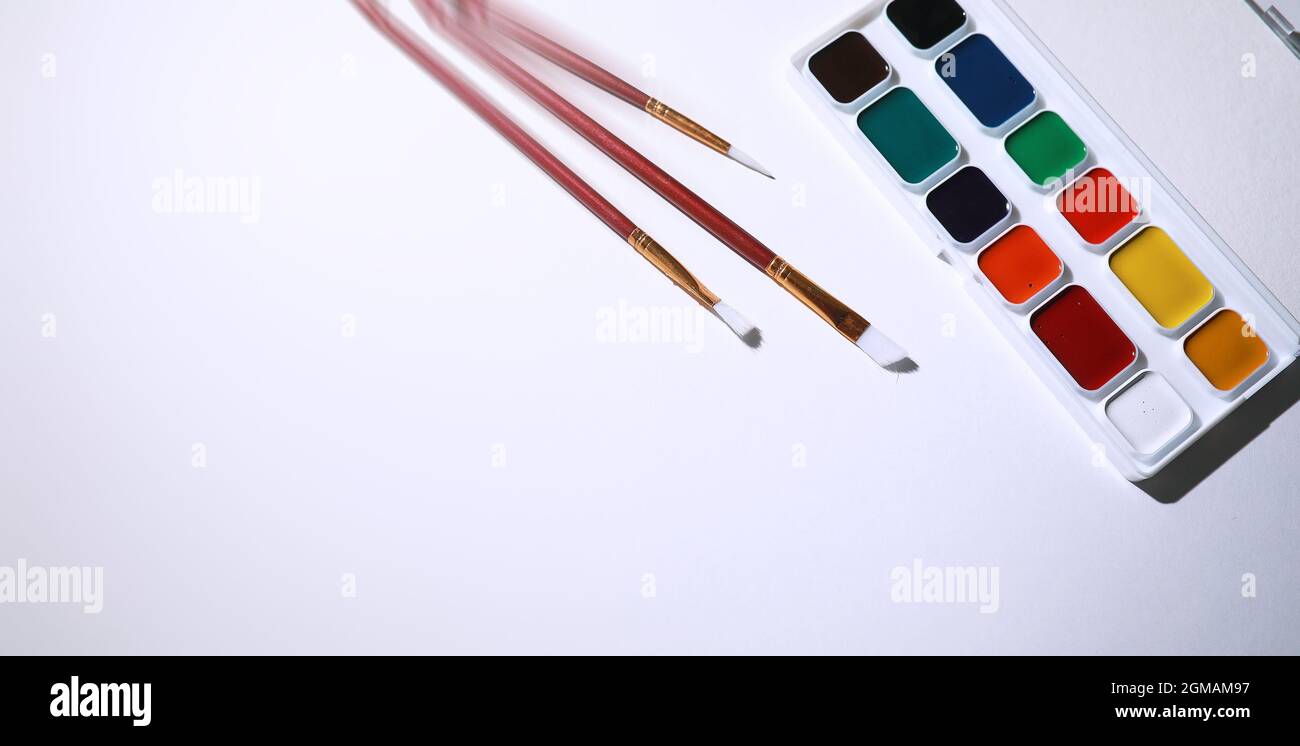Stationery for drawing paints on a white sheet of paper Stock Photo - Alamy