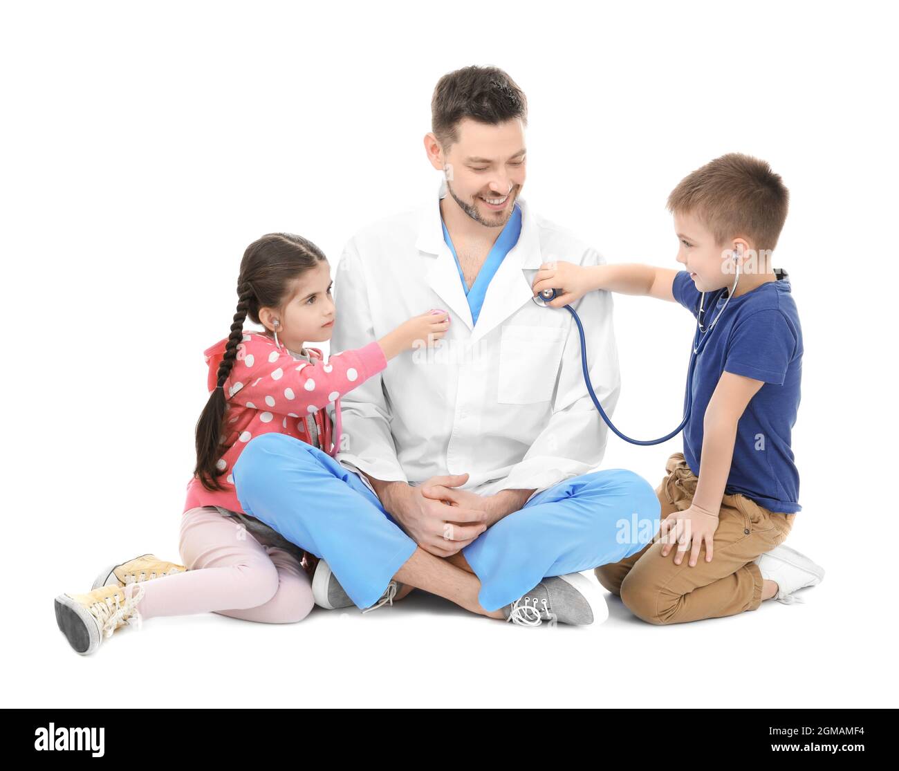 Children's doctor with little kids on white background Stock Photo - Alamy