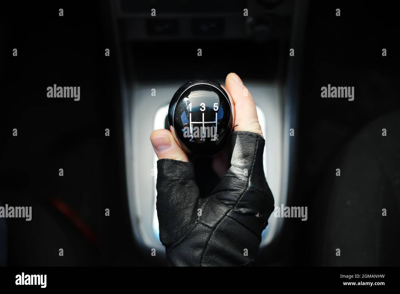 Gear lever. Manual Transmission. Hand on the gear shift in the car ...