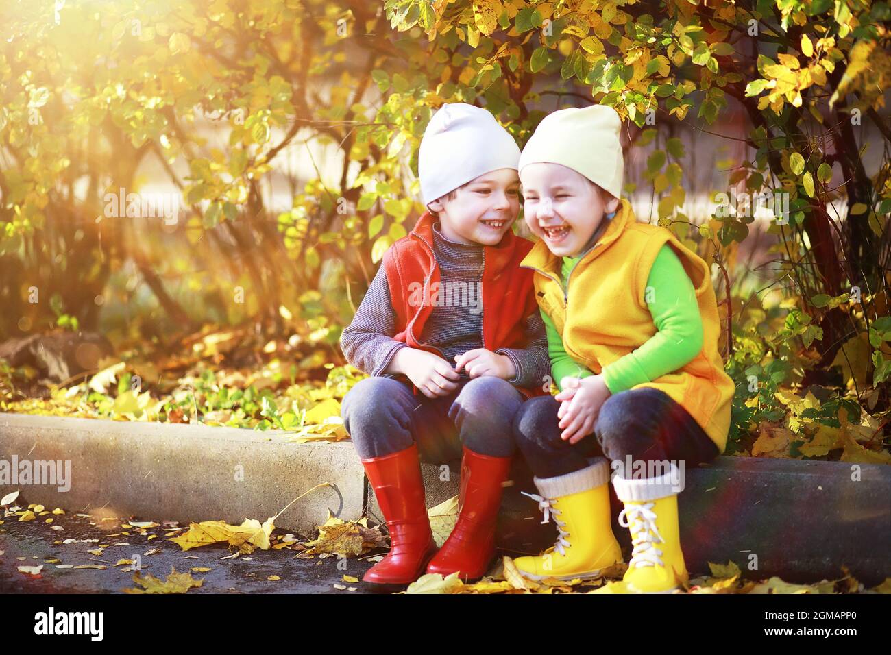 Children walk in the autumn park in the fall Stock Photo - Alamy