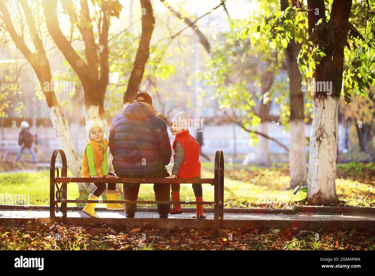 Children walk in the autumn park in the fall Stock Photo - Alamy
