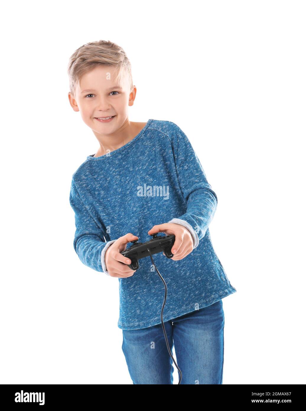 Cute boy with video game controller on white background Stock Photo - Alamy