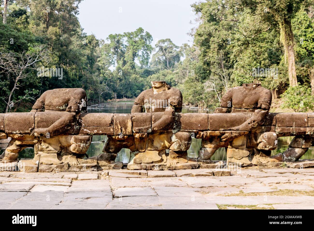 ancient sculptures on bridge of Preah Khan temple in Angkor Wat ...