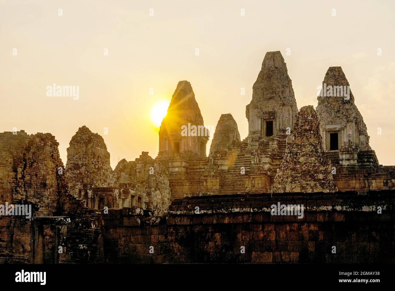 old ruins of East Baray temple with golden sunset in Angkor city ...