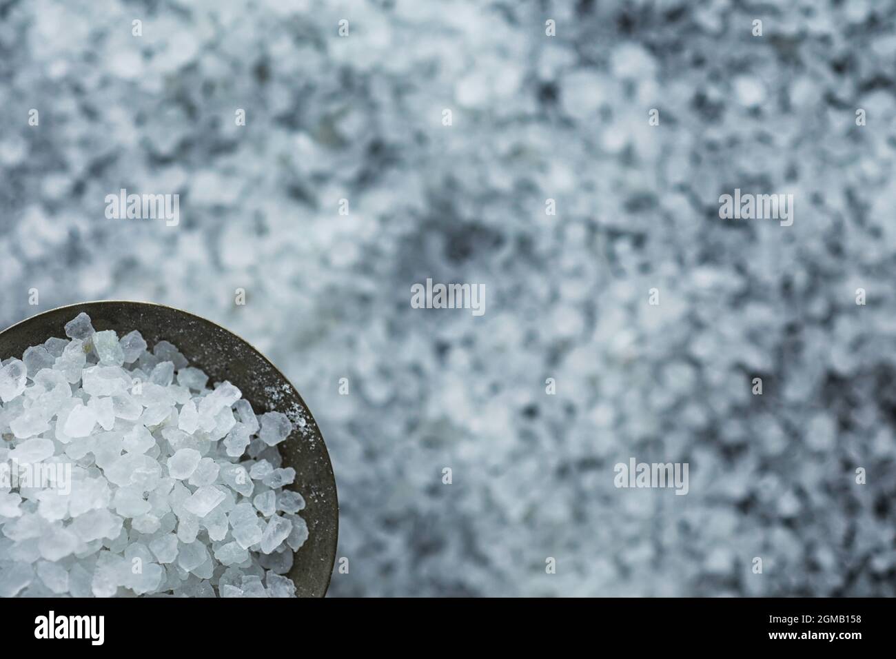 Large sea salt. Spice. Mortar and pestle for grinding salt Stock Photo ...
