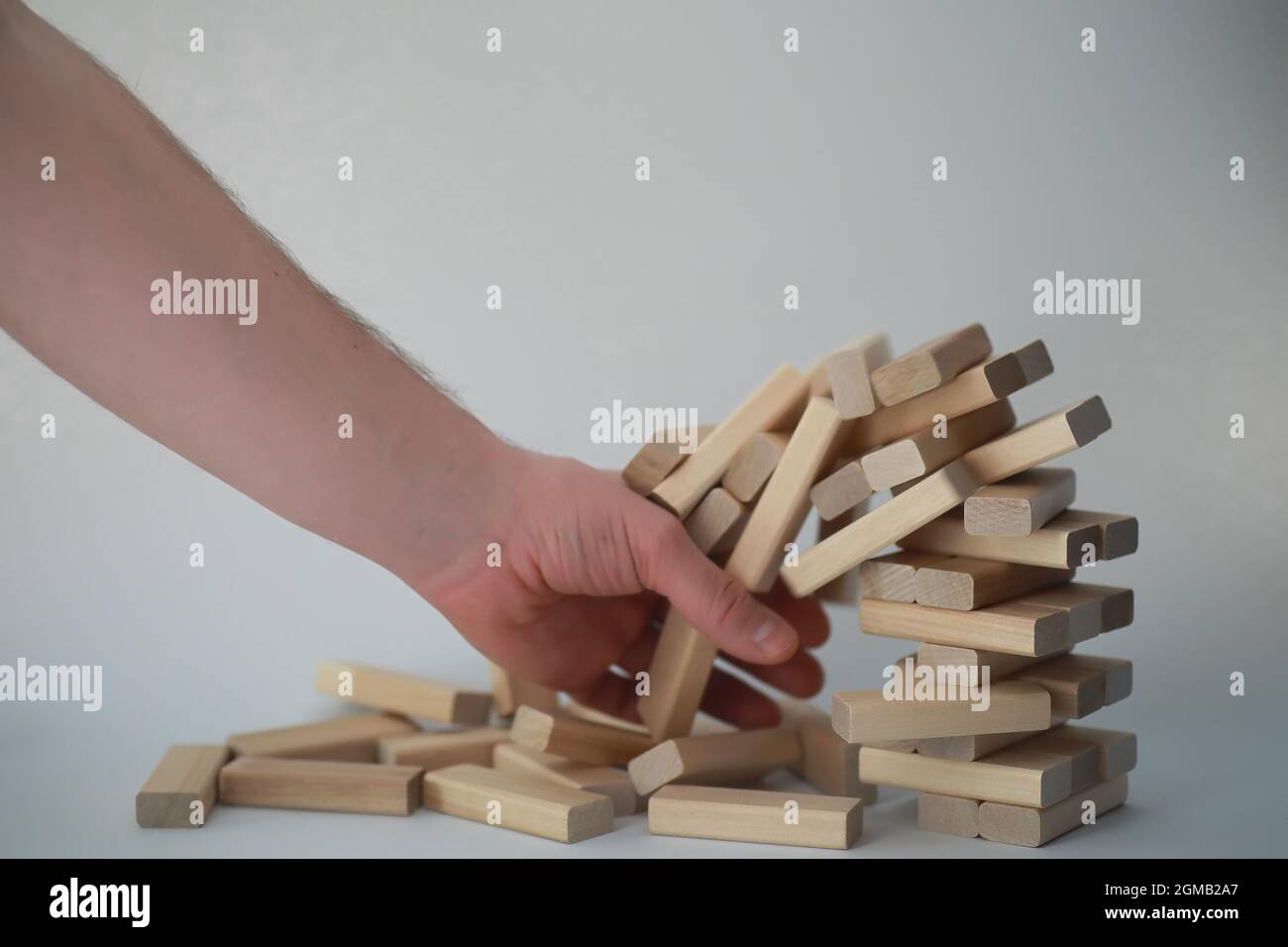 Board game jenga tower of light wood sticks Stock Photo - Alamy