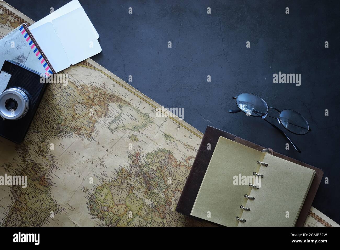 Travel concept. Map on the table and model aircraft Stock Photo - Alamy