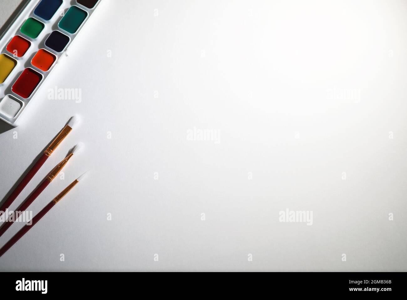 Stationery for drawing paints on a white sheet of paper Stock Photo - Alamy