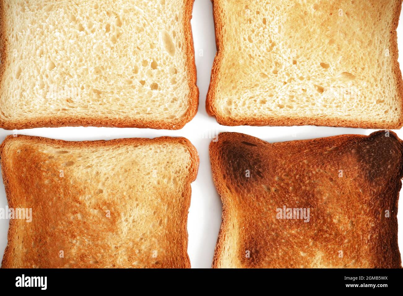 Toasted bread on white background Stock Photo - Alamy