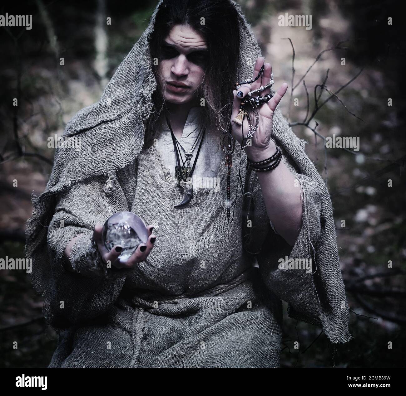 Fairy magician. A sorcerer with a glass sphere, a magical spell and a ...