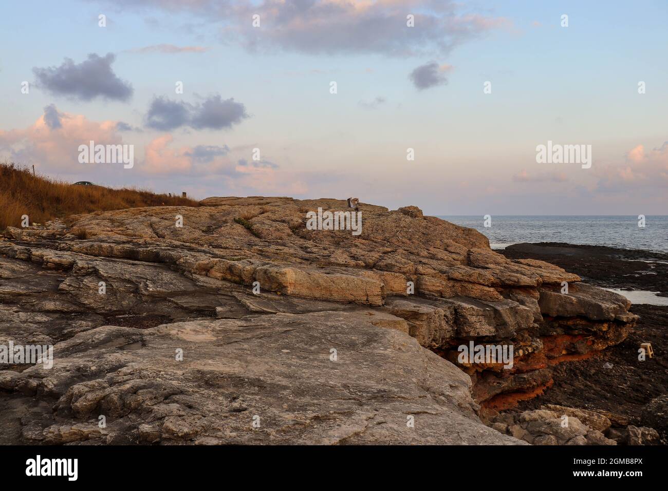 Colorful rocky coastline Stock Photo - Alamy