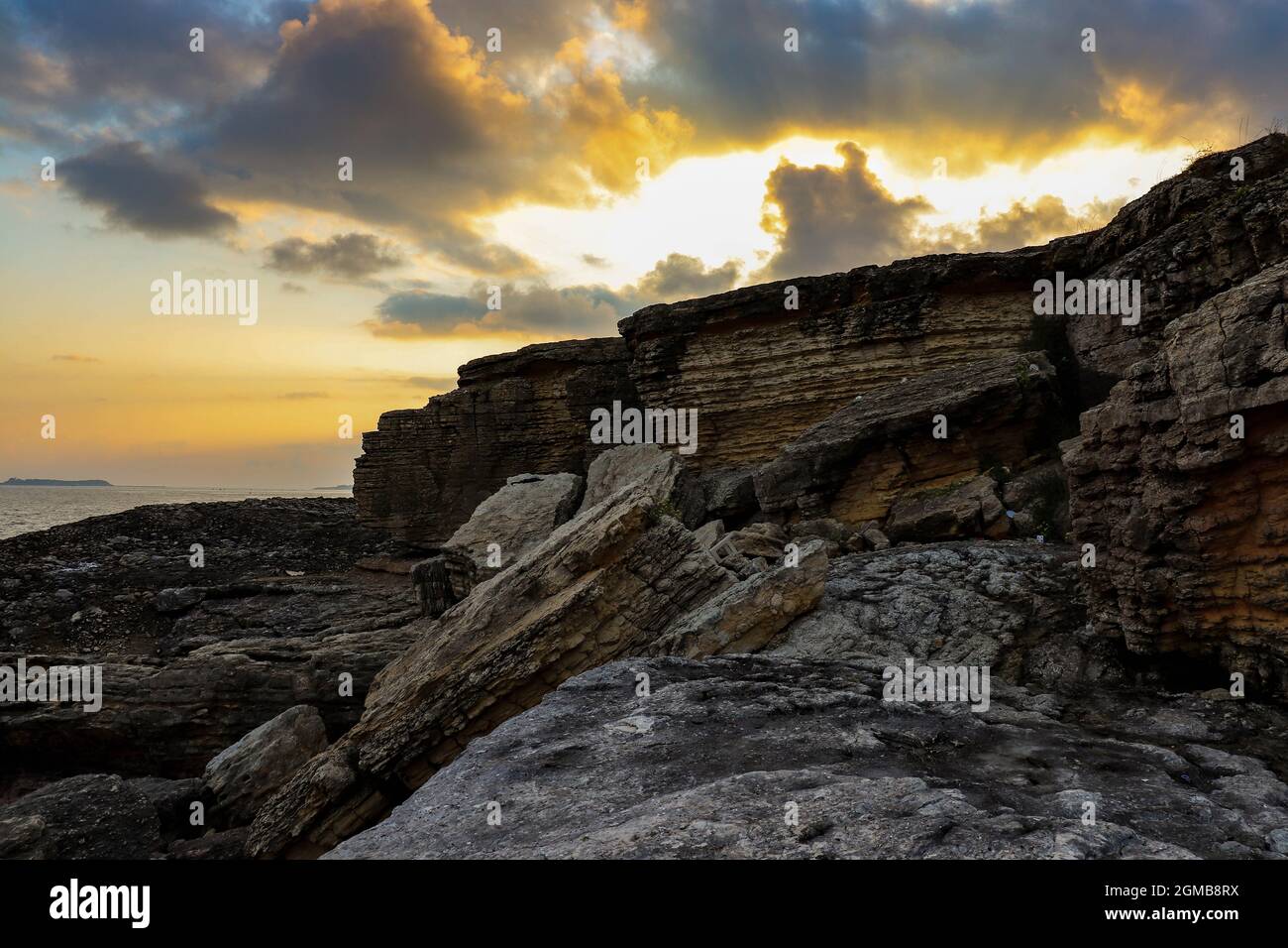 Colorful rocky coastline Stock Photo - Alamy