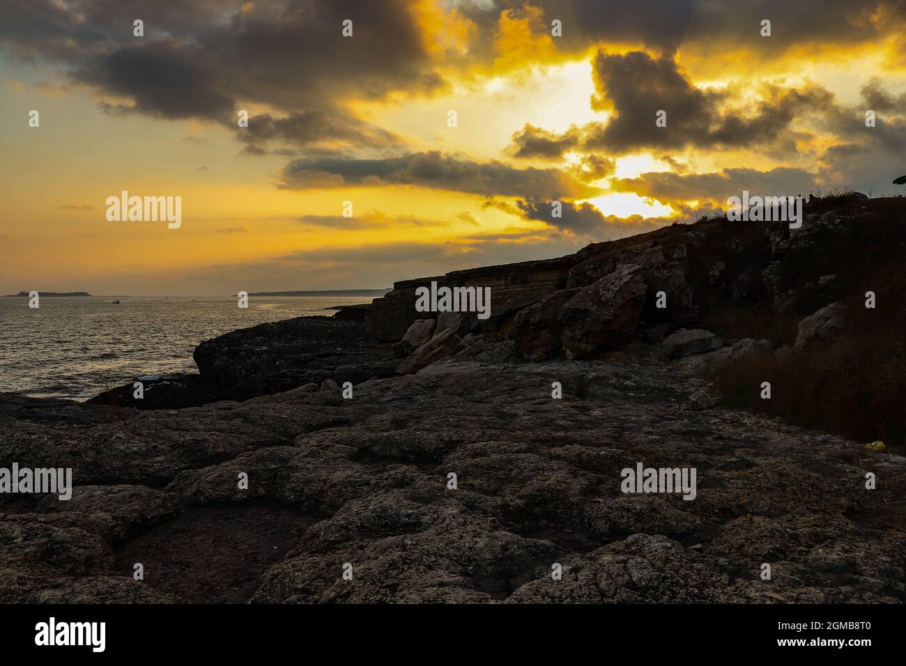 Colorful rocky coastline Stock Photo - Alamy