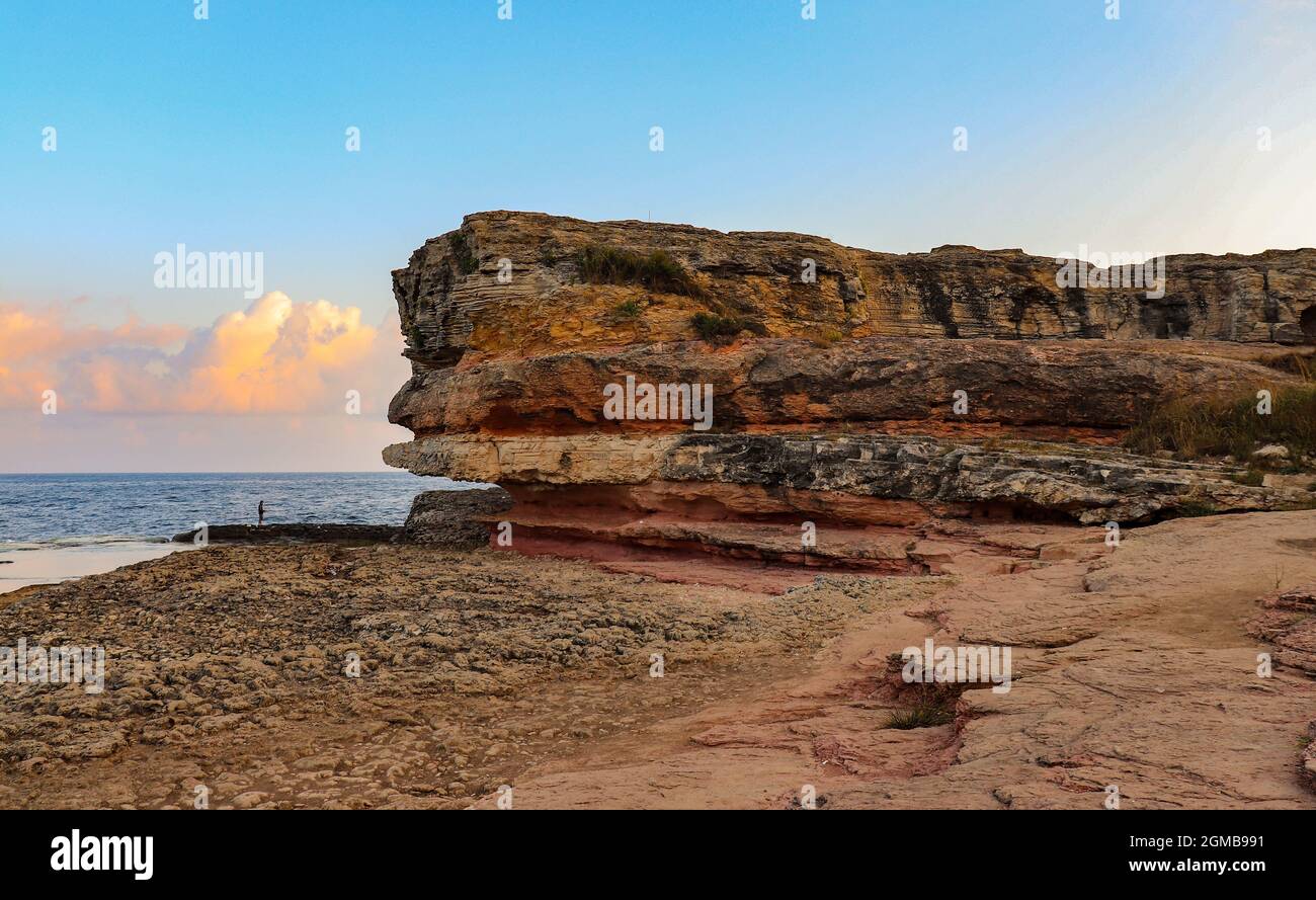Colorful rocky coastline Stock Photo - Alamy