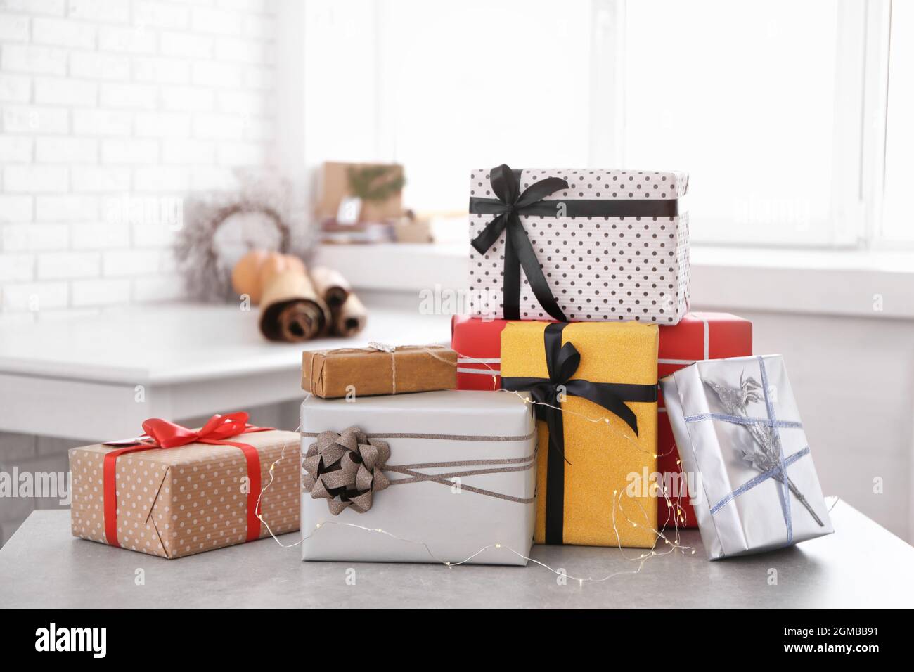 Beautiful gift boxes on table Stock Photo - Alamy