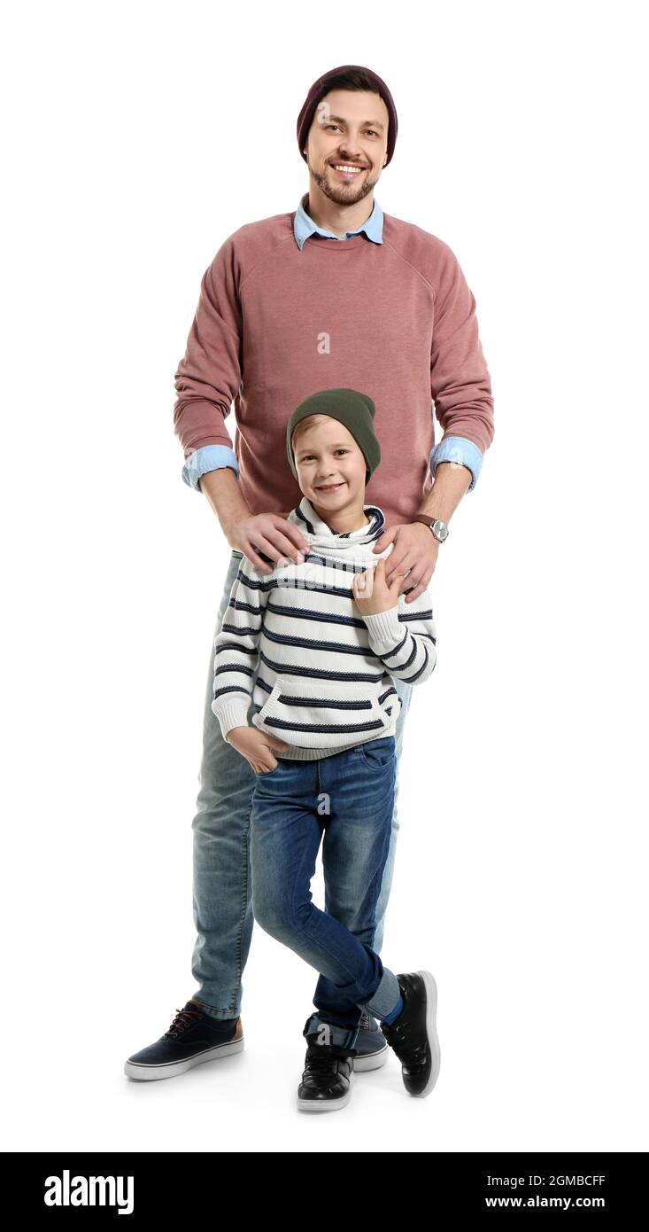 Stylish father and son on white background Stock Photo - Alamy