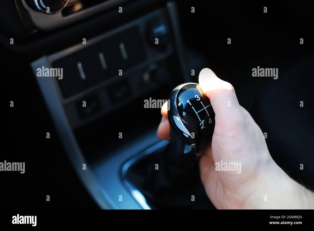 Gear lever. Manual Transmission. Hand on the gear shift in the car ...