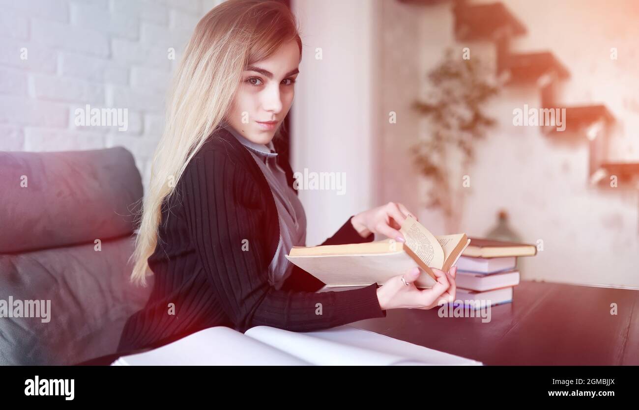 Young pretty blonde girl student before class Stock Photo - Alamy