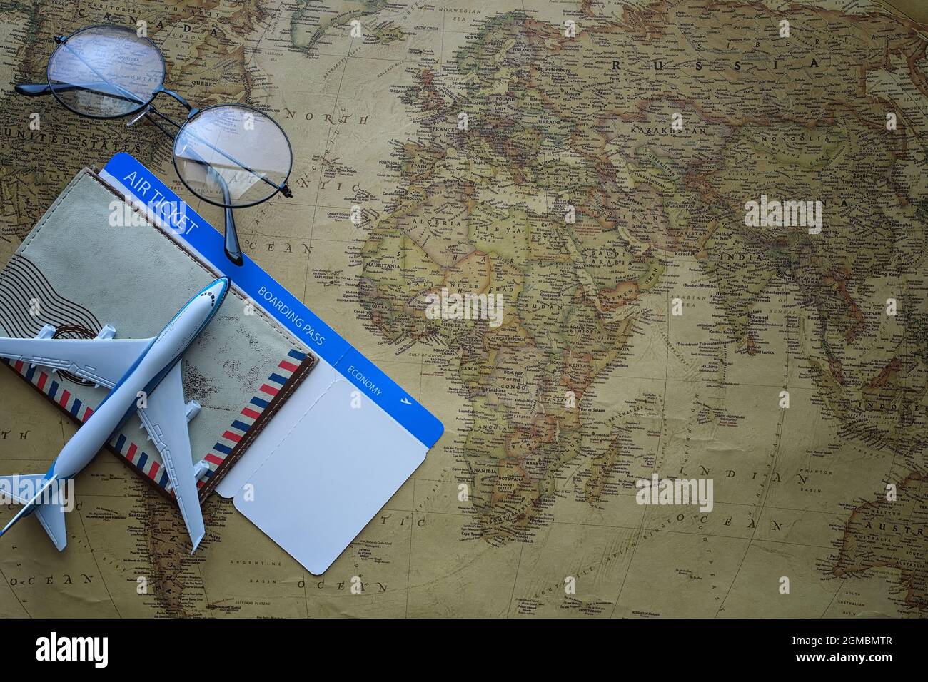 Travel concept. Map on the table and model aircraft Stock Photo - Alamy