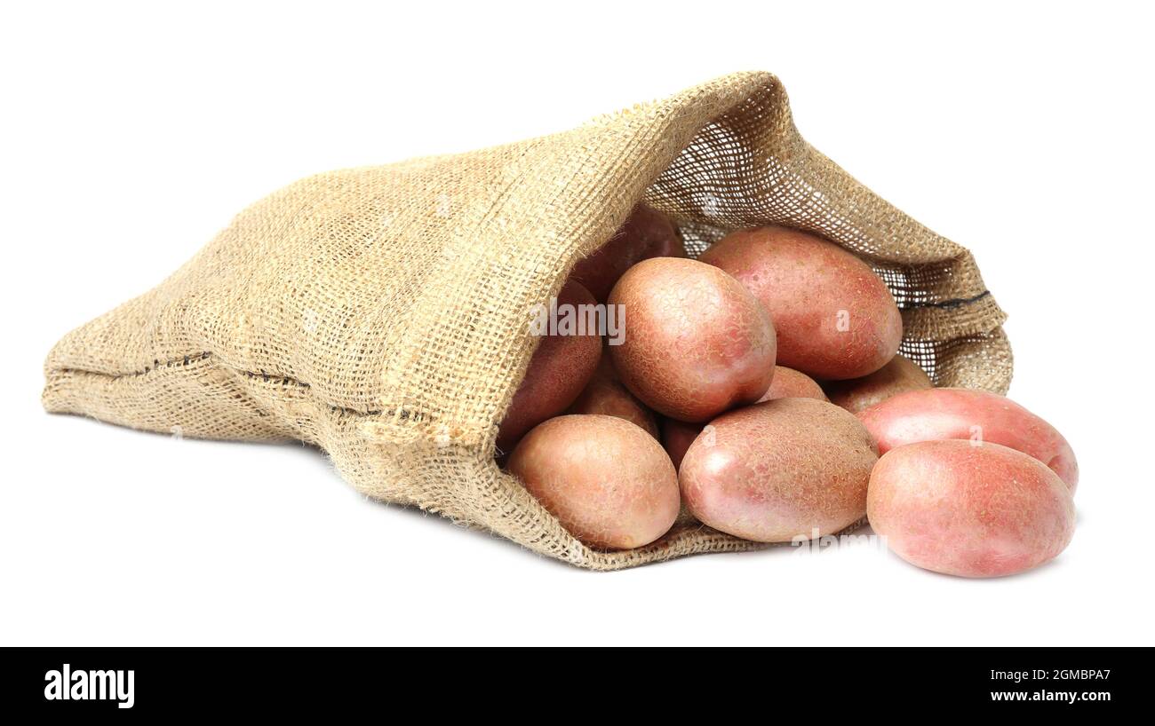 Sack of fresh raw potatoes on white background Stock Photo - Alamy