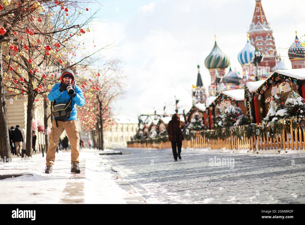 Journey. A tourist with a camera takes photos of beautiful places Stock ...