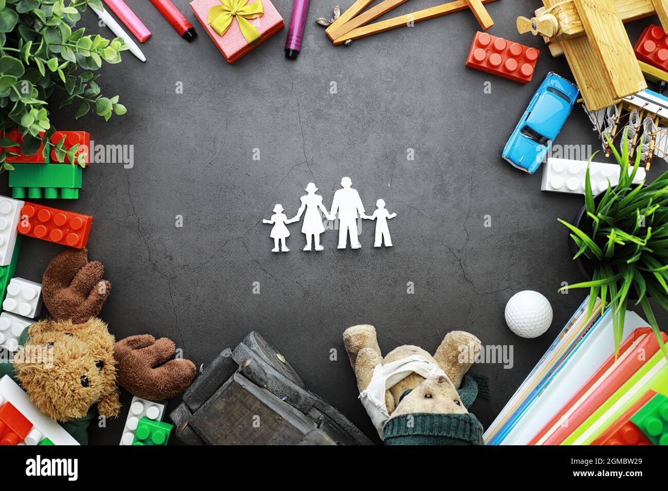 Background. Children's toys on the table. The space between kid's toys ...