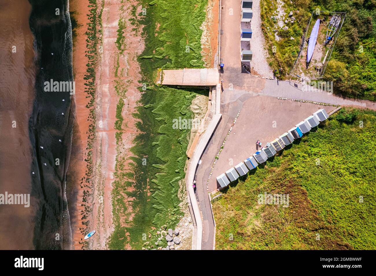 Beach huts on Broadsands Beach from a drone, Paignton, Devon, England ...