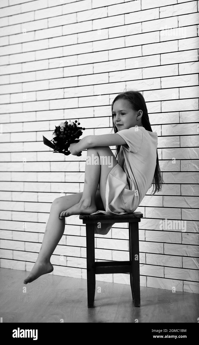 Vintage children sad chair hi-res stock photography and images - Alamy
