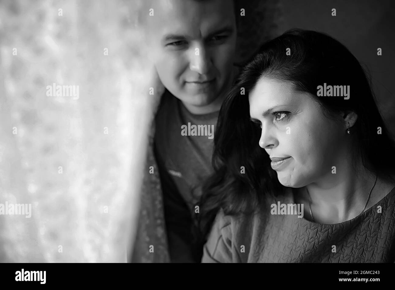 Young white family in a home on weekends relax time Stock Photo - Alamy