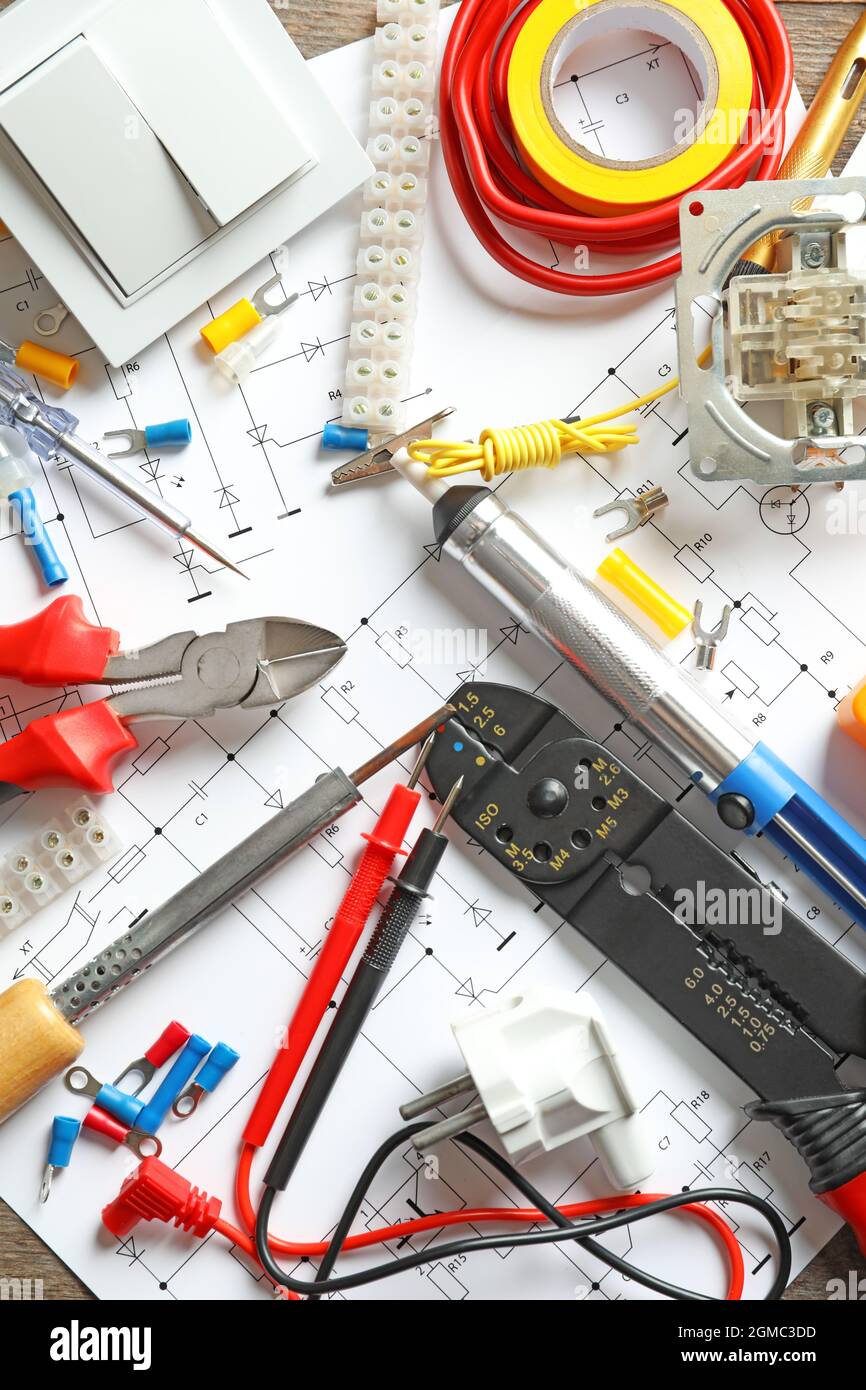 Different electrical tools on circuit diagram Stock Photo - Alamy