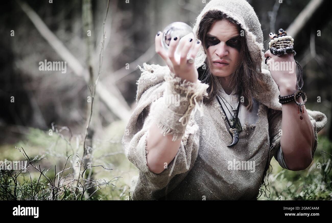 Fairy magician. A sorcerer with a glass sphere, a magical spell and a ...