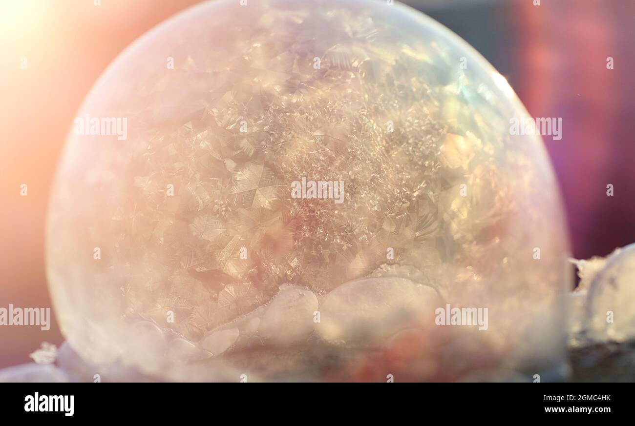 Soap bubbles freeze in the cold. Winter soapy water freezes in air ...