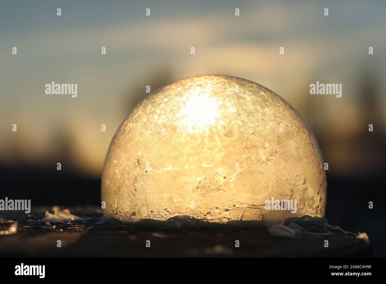 Soap bubbles freeze in the cold. Winter soapy water freezes in air ...