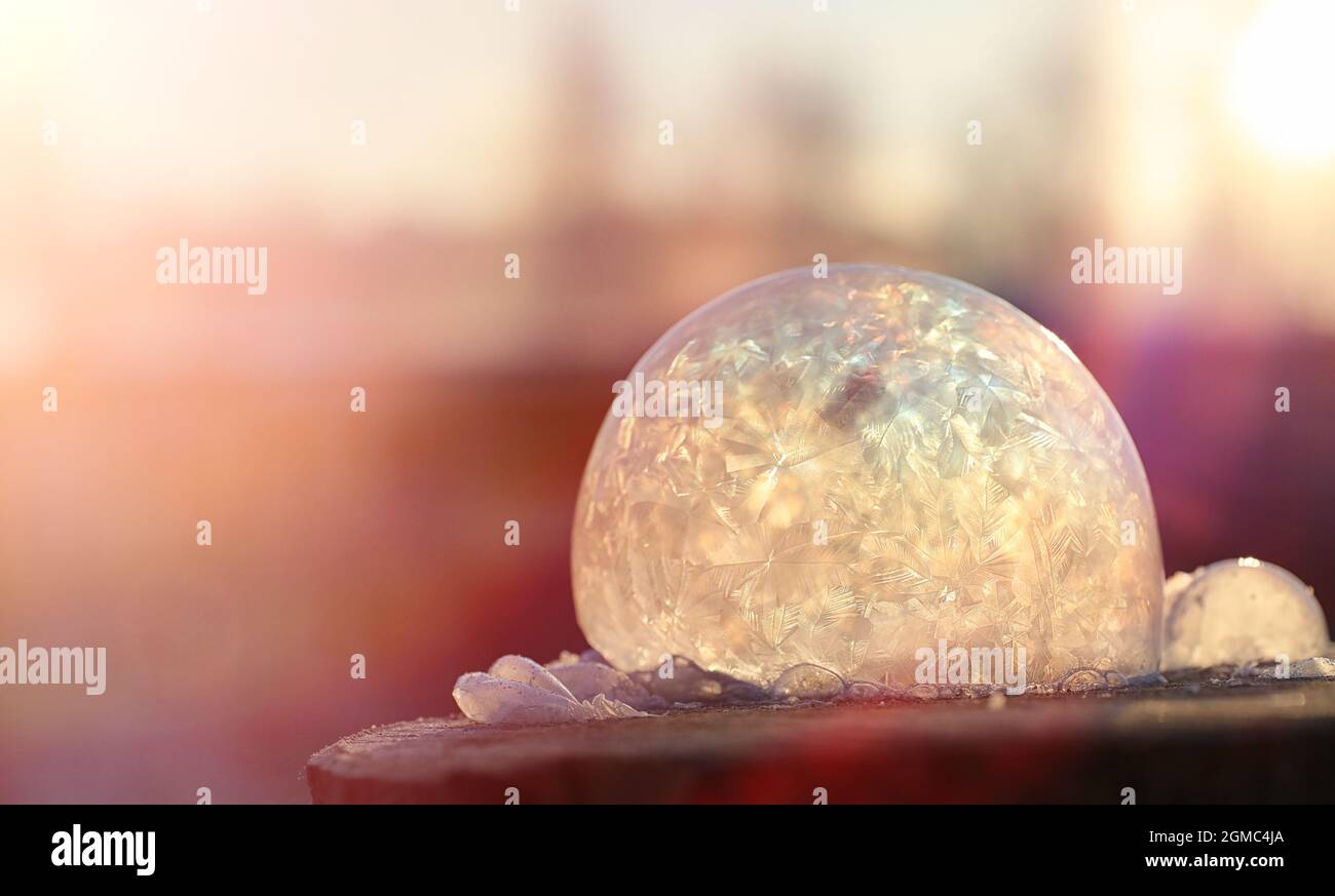 Soap bubbles freeze in the cold. Winter soapy water freezes in air ...
