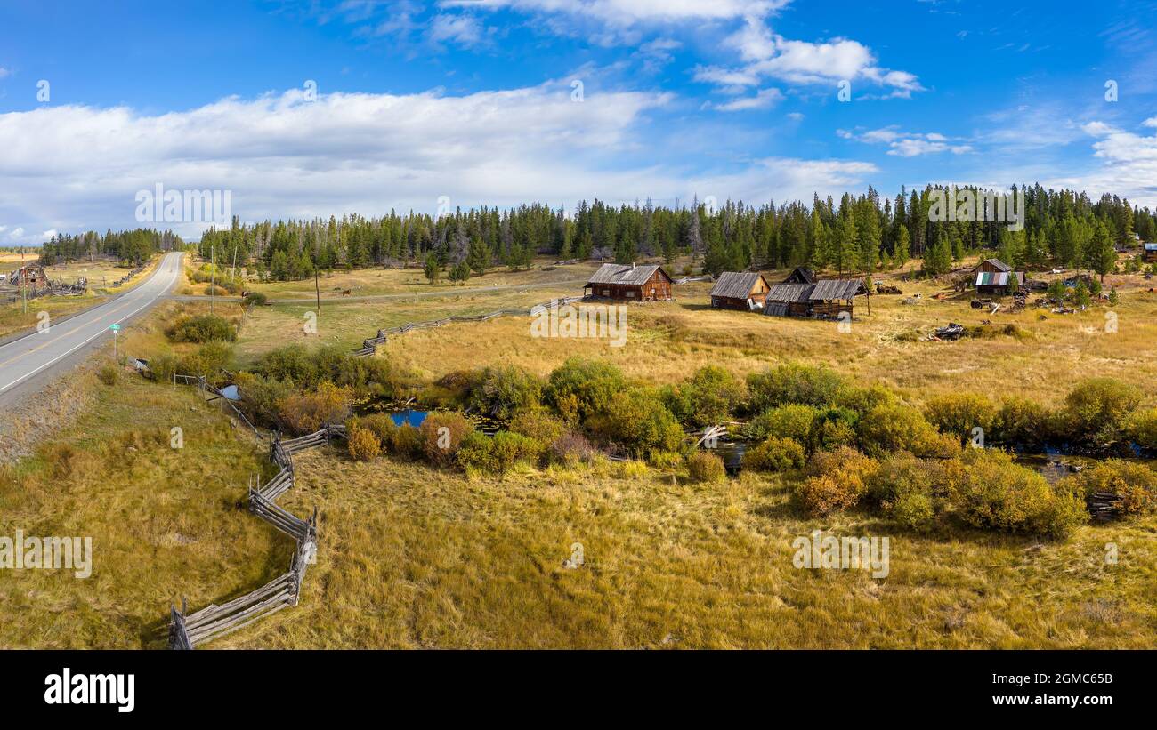 Abandoned and decayed old wooden barn, farm facilities and buildings in ...