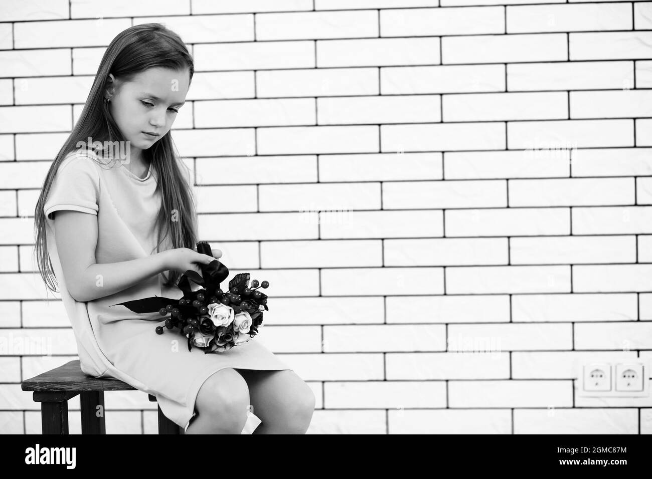 Vintage children sad chair hi-res stock photography and images - Alamy